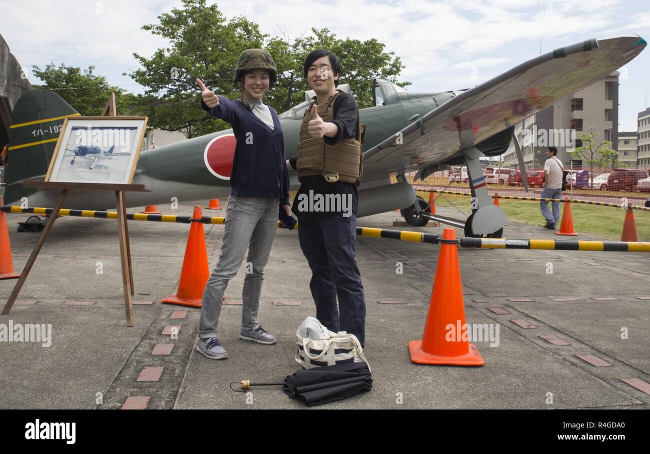 Japanese locals tour the Zero Hangar during the 41st Japan Maritime ...