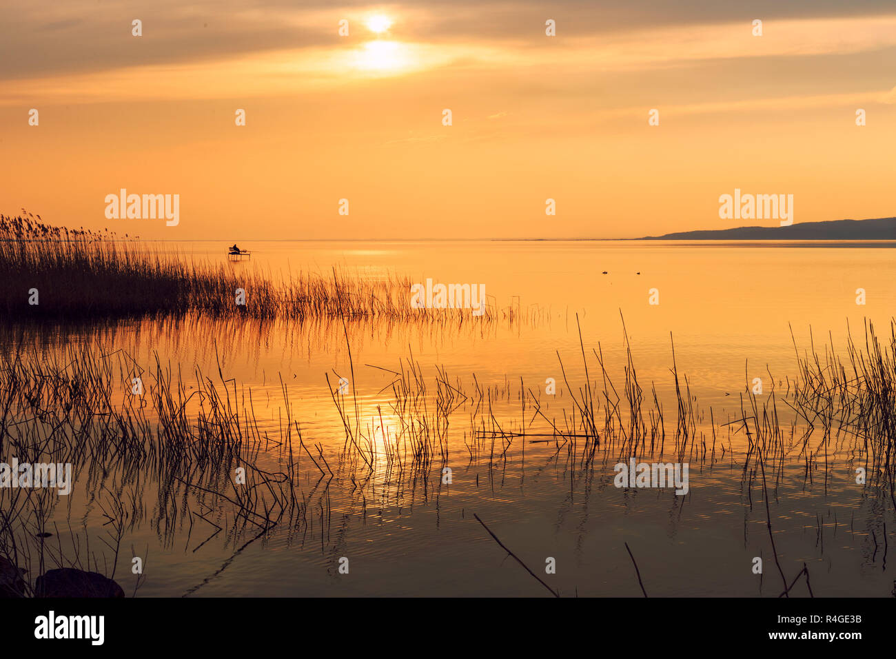 Beautiful sunset in lake Balaton Stock Photo - Alamy