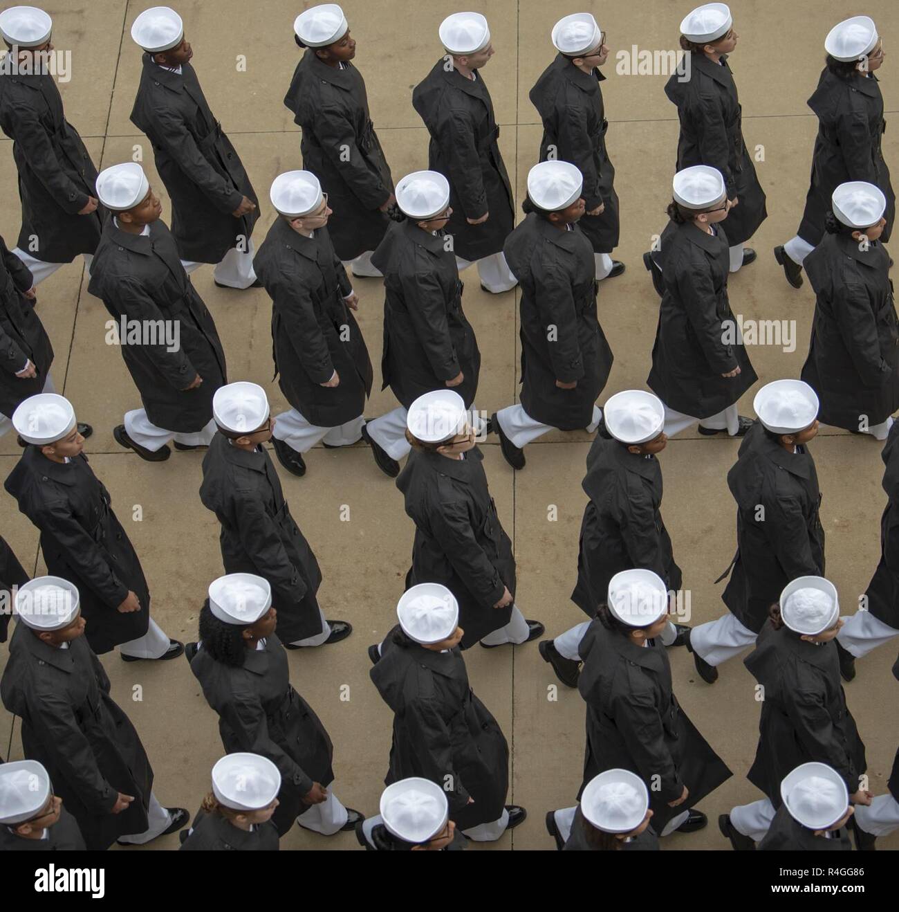 GREAT LAKES, Ill. (Sept. 28, 2018) Sailors march toward Midway ...