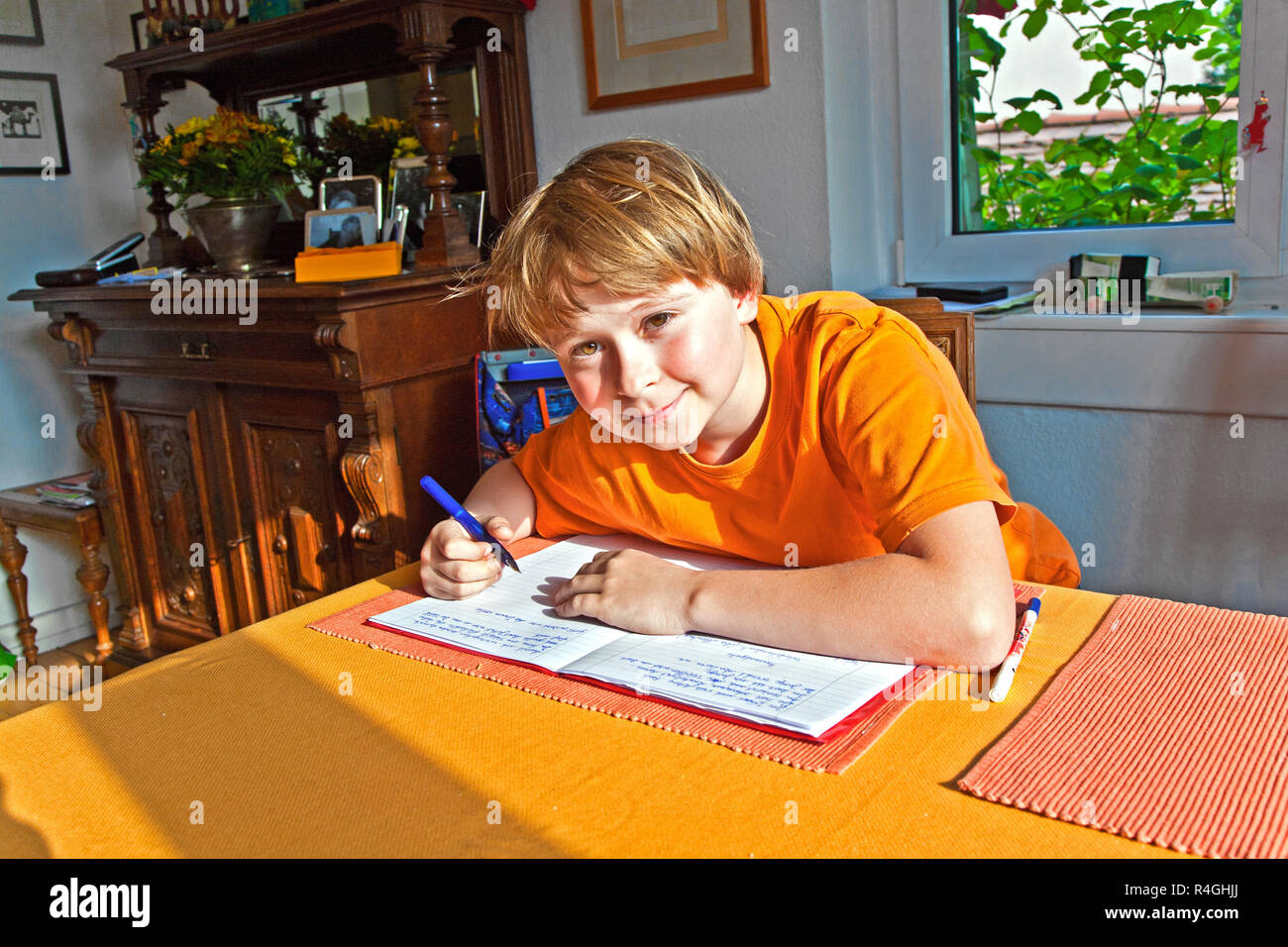 boy doing his homework for school Stock Photo - Alamy