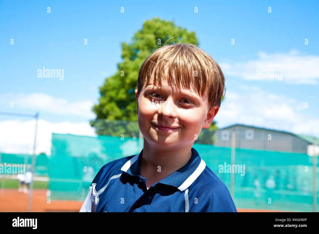 child looks happy and satisfied after the tennis match Stock Photo - Alamy