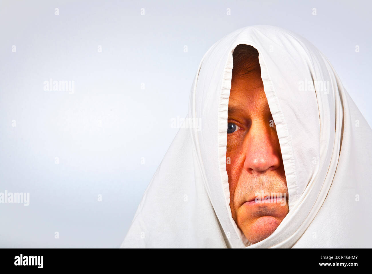 face of man partially covered Stock Photo - Alamy