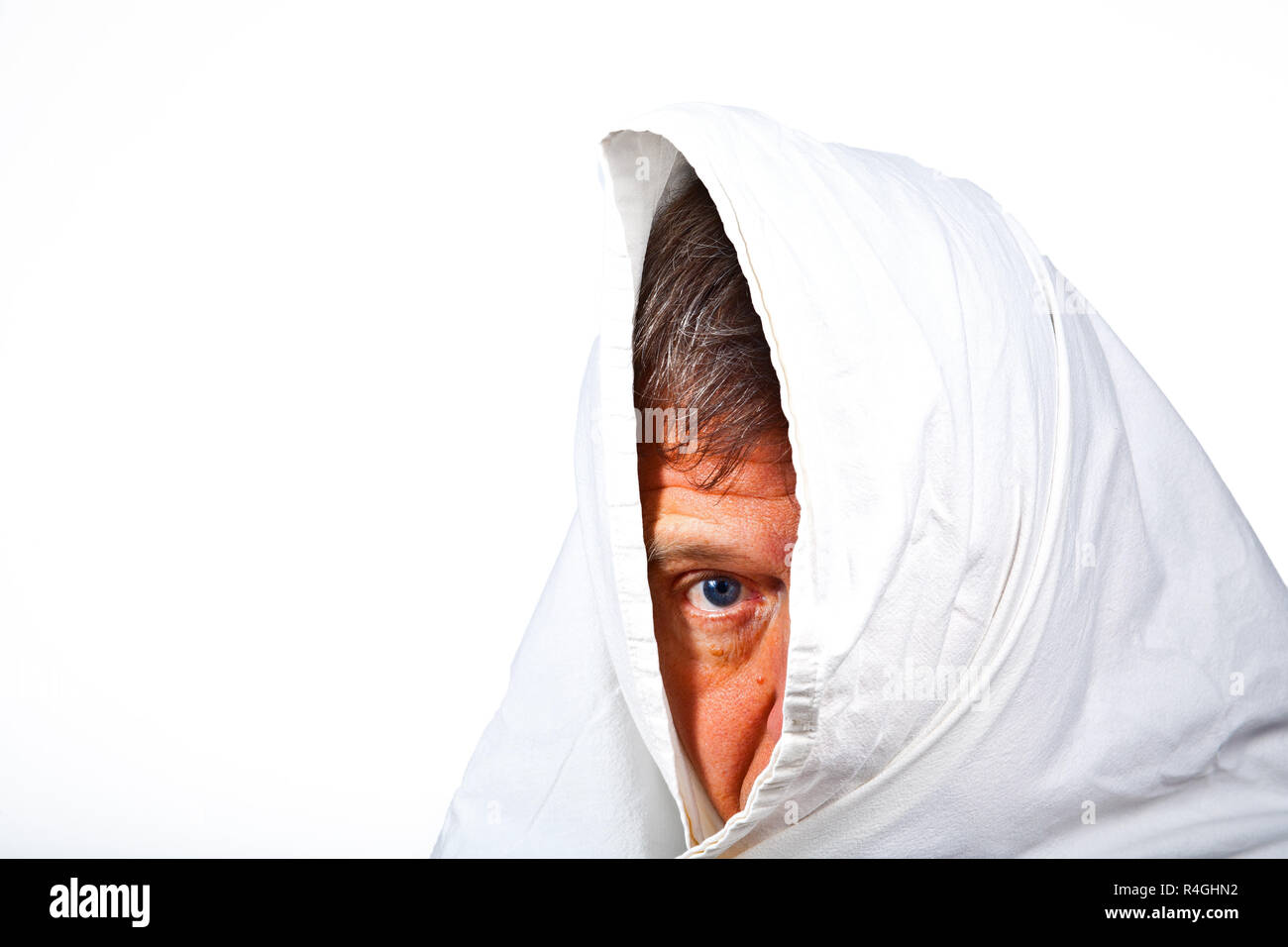 Partially covered by white sheet hi-res stock photography and images ...