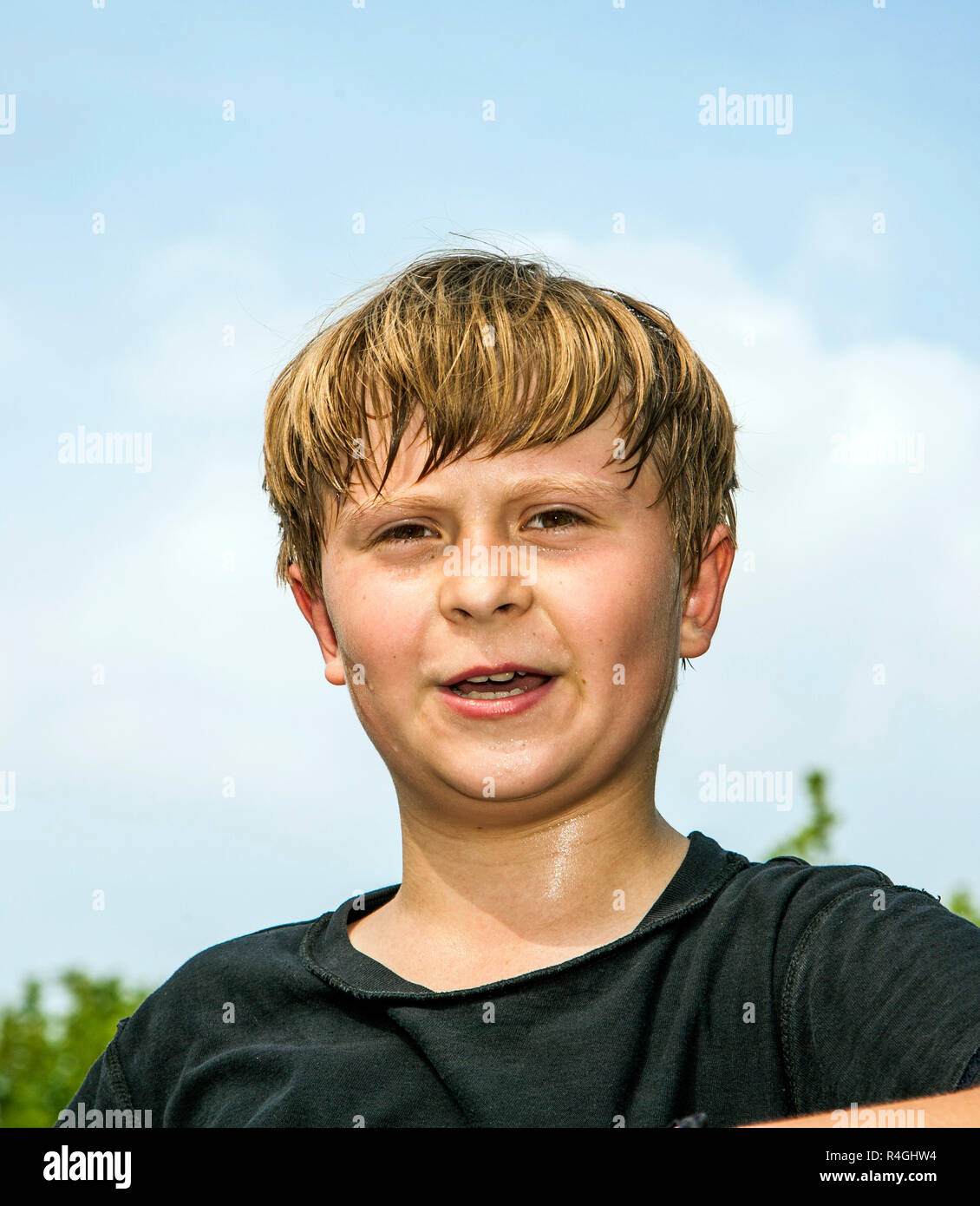 sweating boy after sports Stock Photo - Alamy