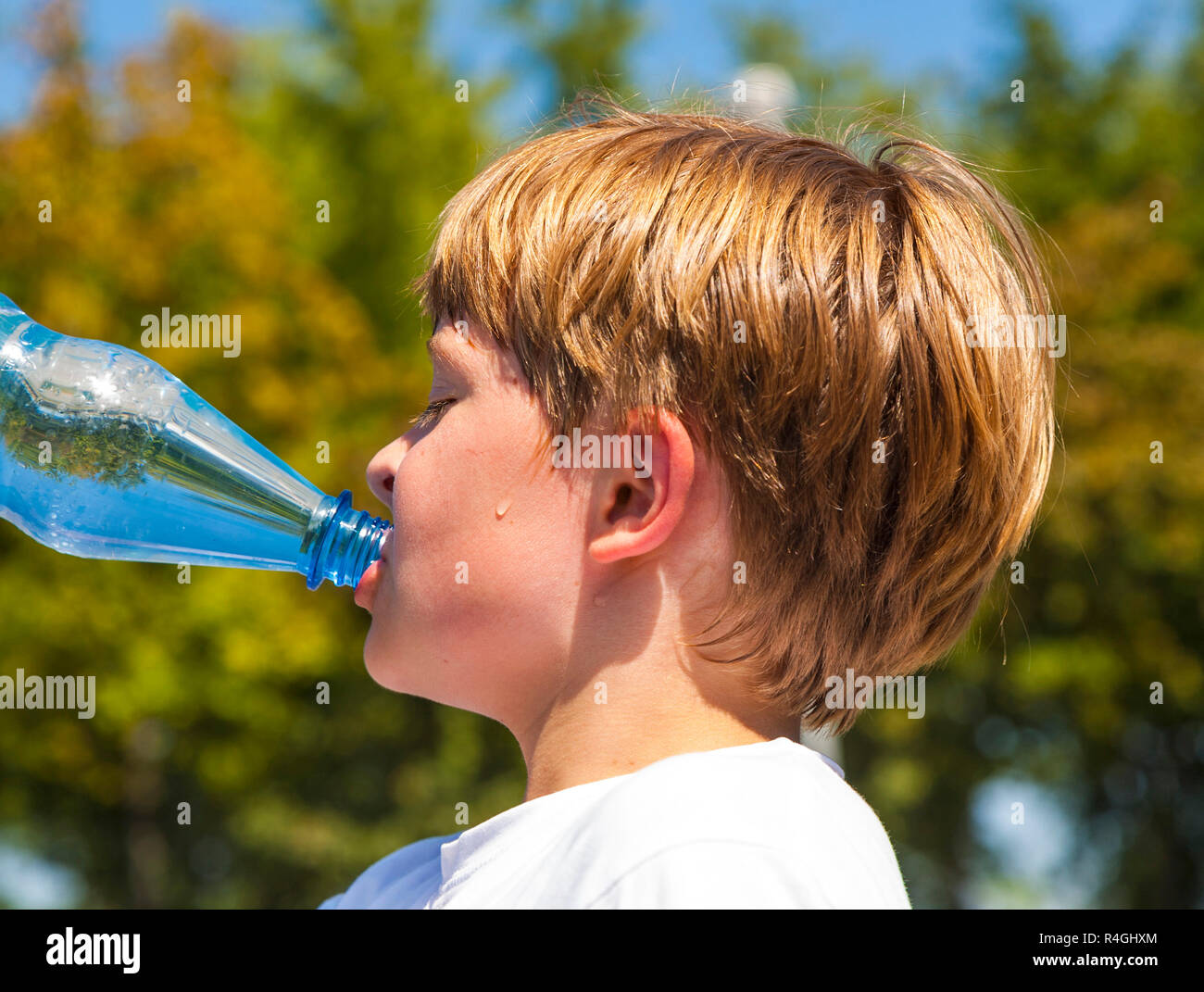 Child sweating drink water hi-res stock photography and images - Alamy