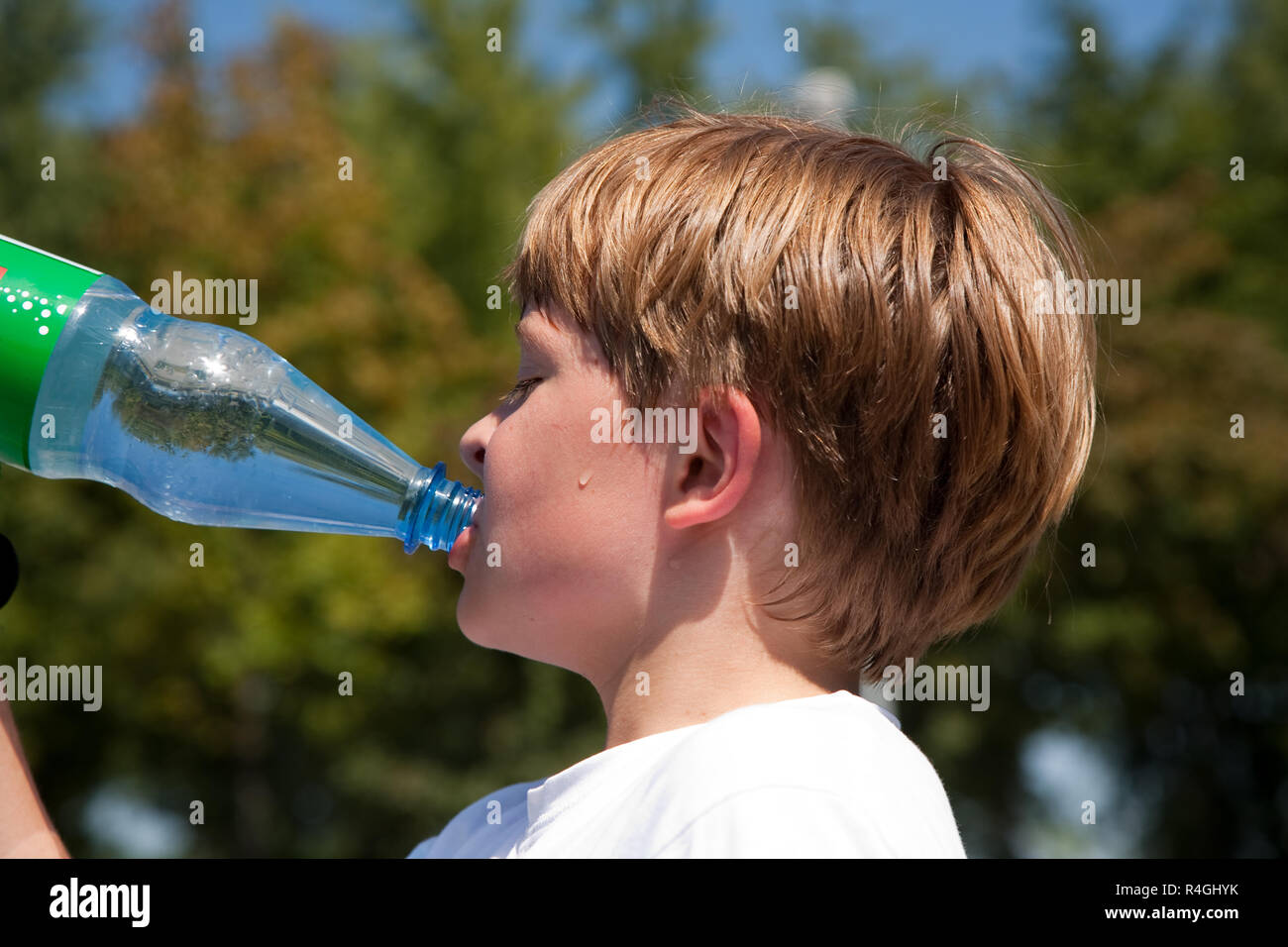 Child sweating drink water hi-res stock photography and images - Alamy