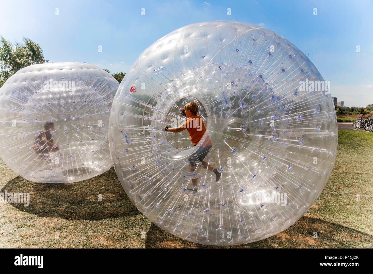 Children zorbing hi-res stock photography and images - Alamy