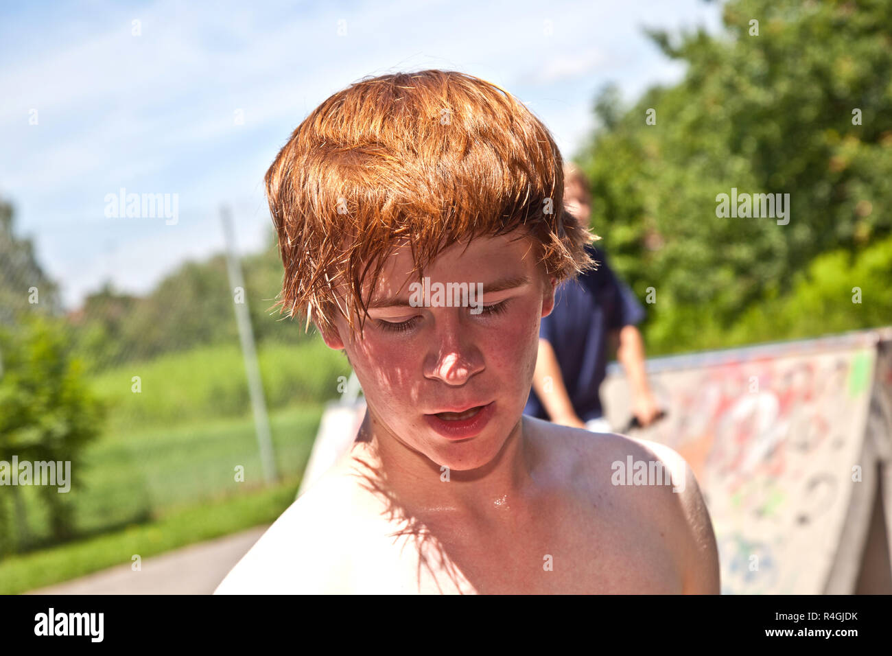 young happy boy sweating and exhausted from sports Stock Photo - Alamy