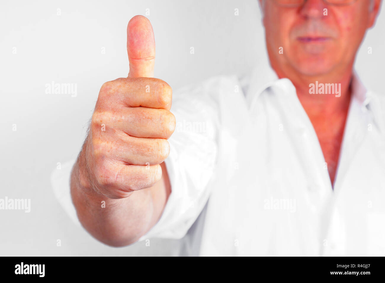 Hand gesturing the all right symbol Stock Photo - Alamy