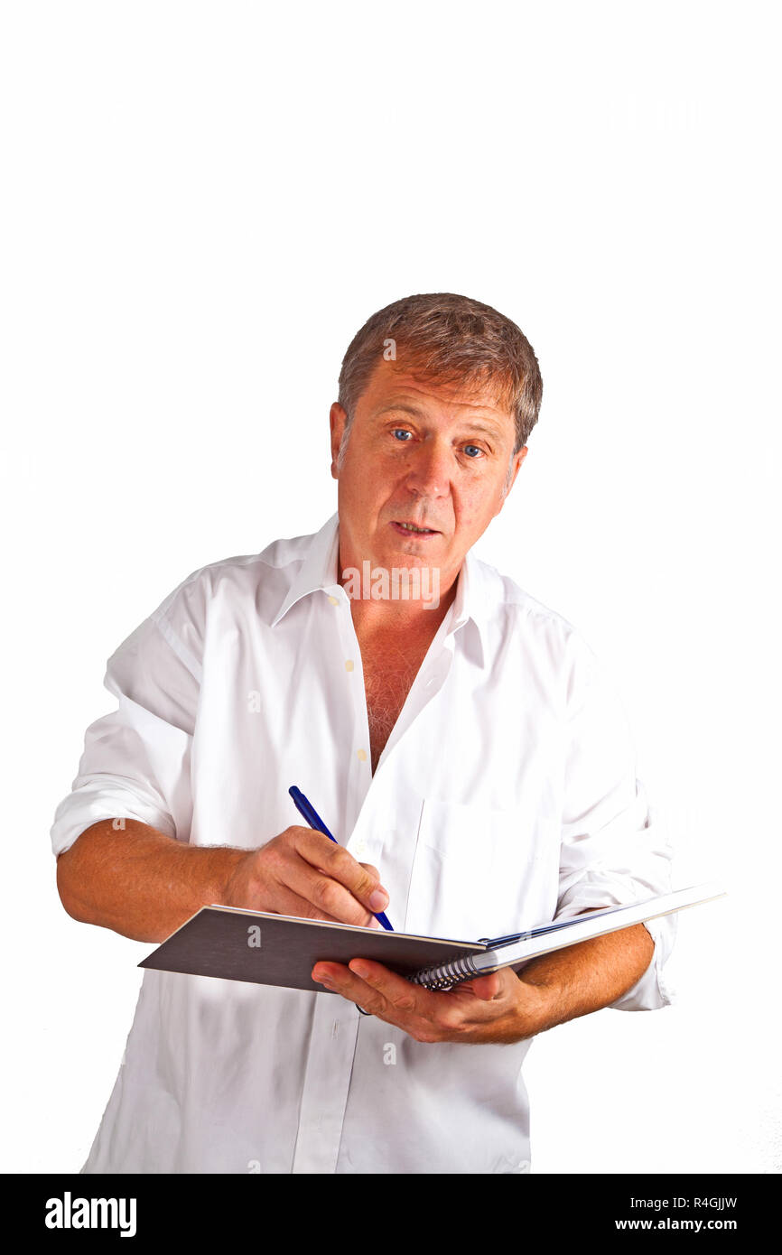 man writing in a book Stock Photo - Alamy
