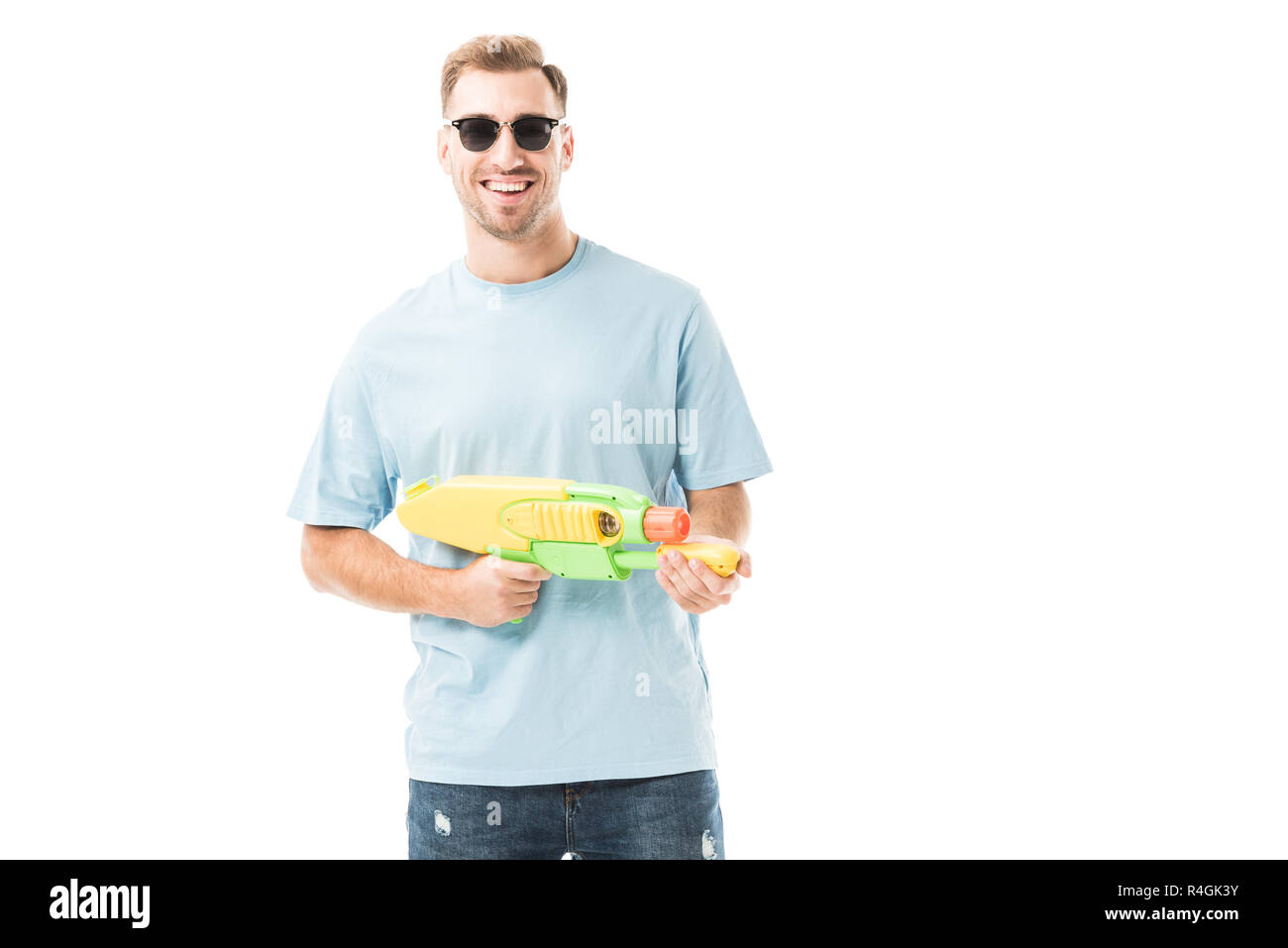 Man holding water gun hi-res stock photography and images - Alamy