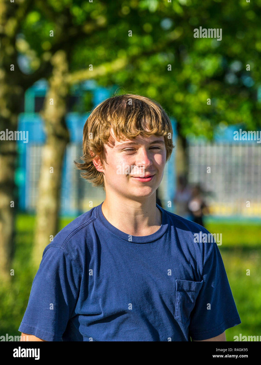 boy in motion is happy and smiles Stock Photo - Alamy