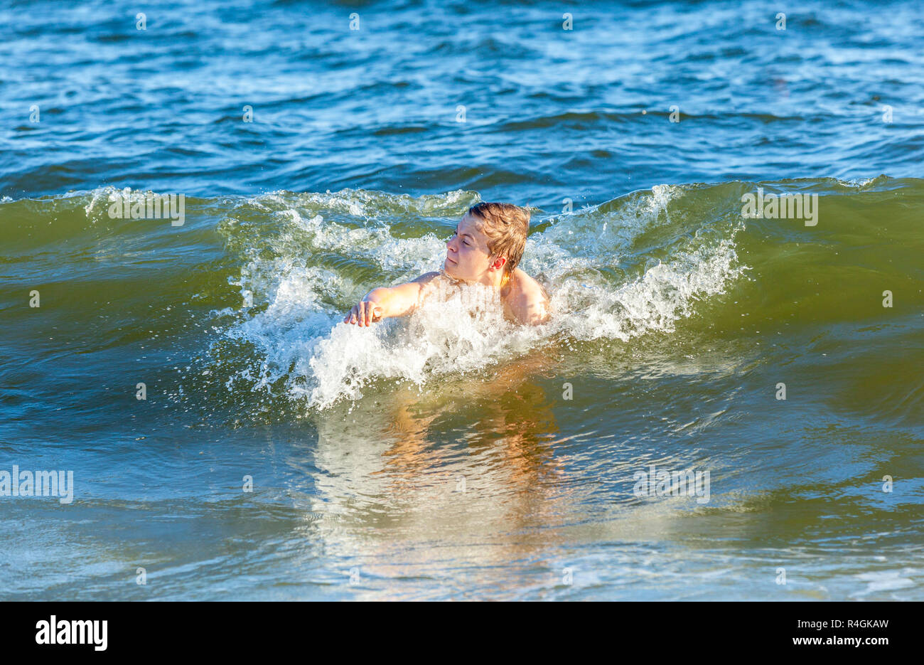 Smiling tall teen boy hi-res stock photography and images - Alamy