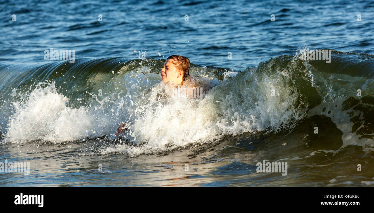 Smiling tall teen boy hi-res stock photography and images - Alamy