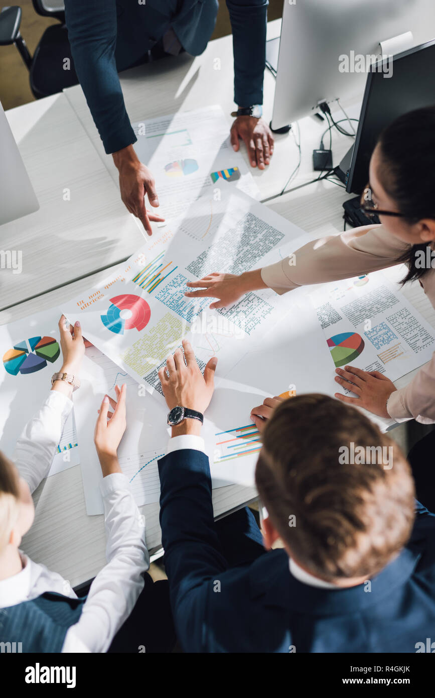 Beautiful women working charts graphs hi-res stock photography and ...