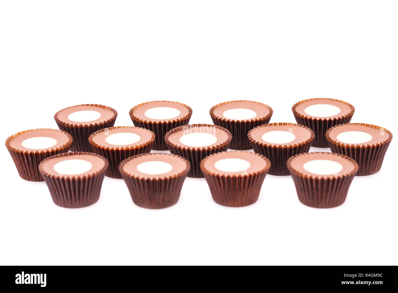 Heap of chocolate isolated on white background Stock Photo - Alamy