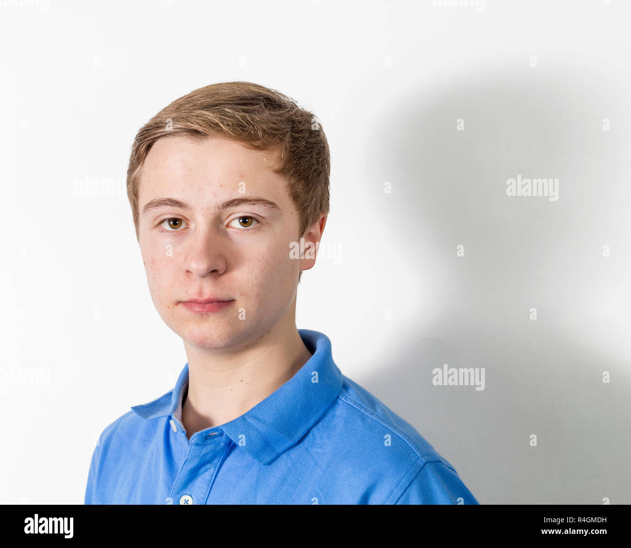 serious looking boy Stock Photo - Alamy