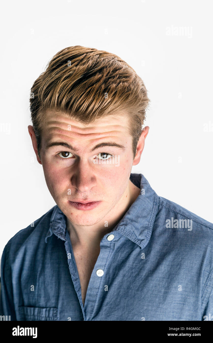 cool boy with red hair posing in studio Stock Photo - Alamy