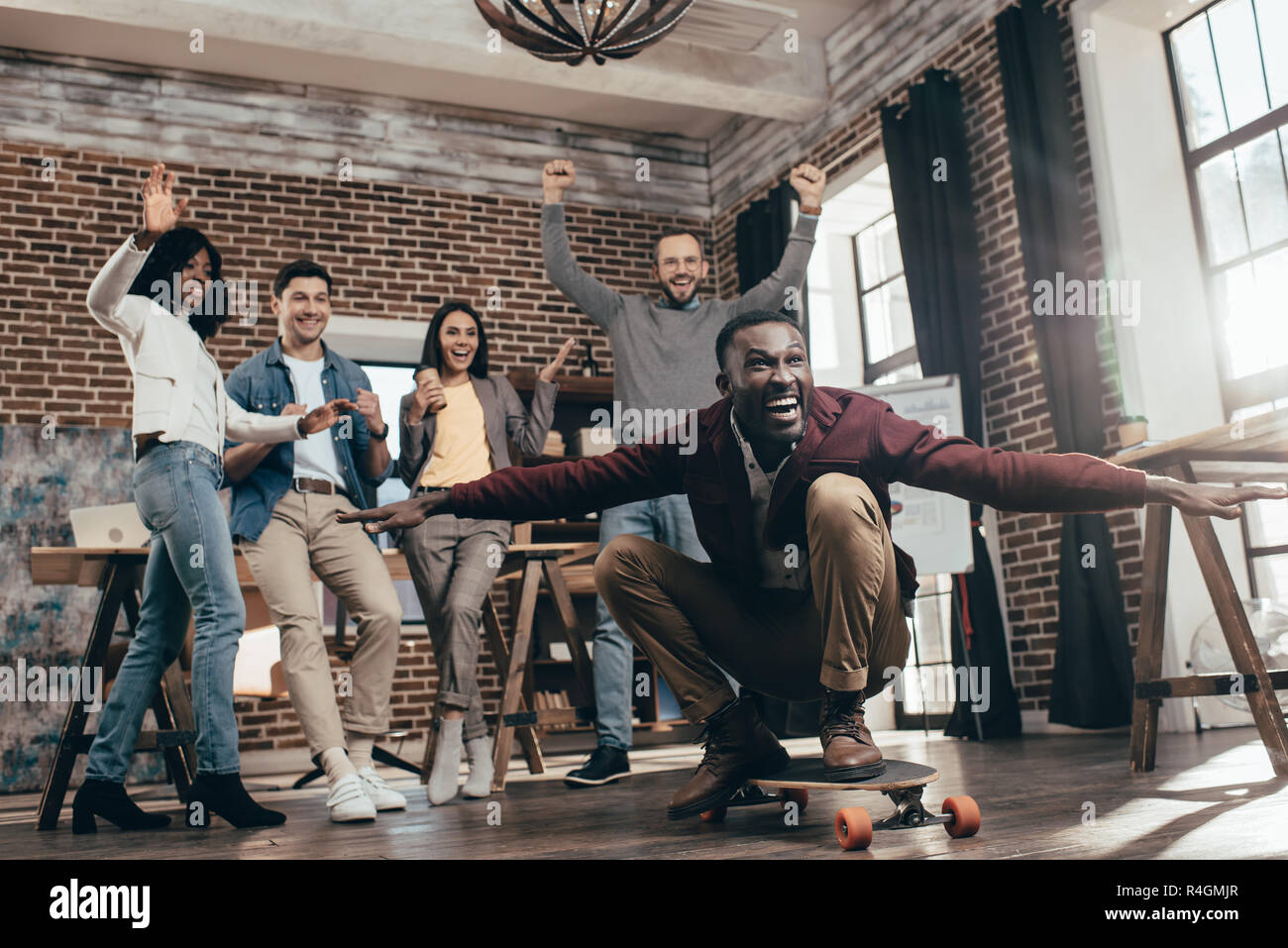 Group happy multiracial coworkers in hi-res stock photography and ...