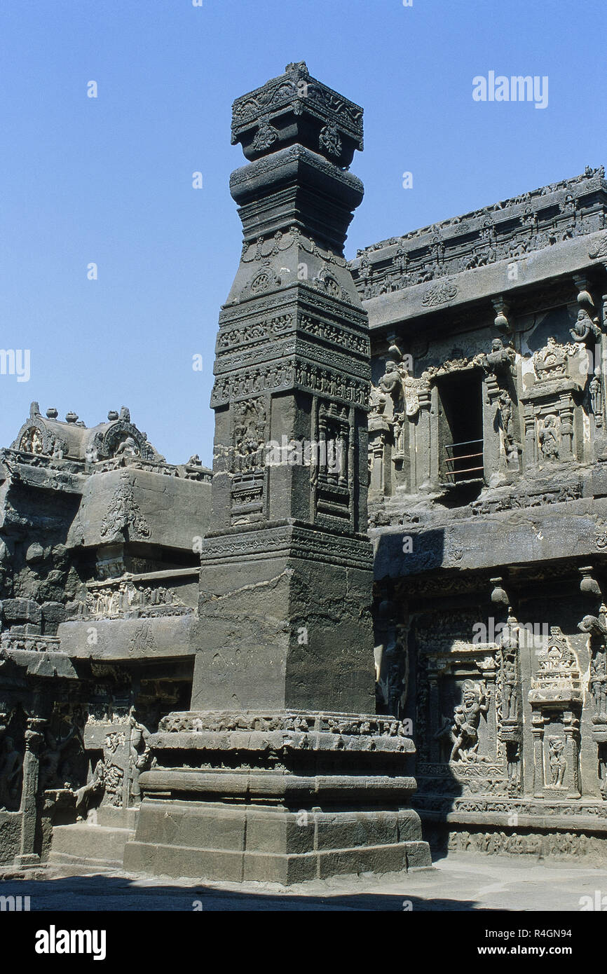 Carved Dhwaja Stambha outside Kailasa temple, Ellora, Aurangabad ...