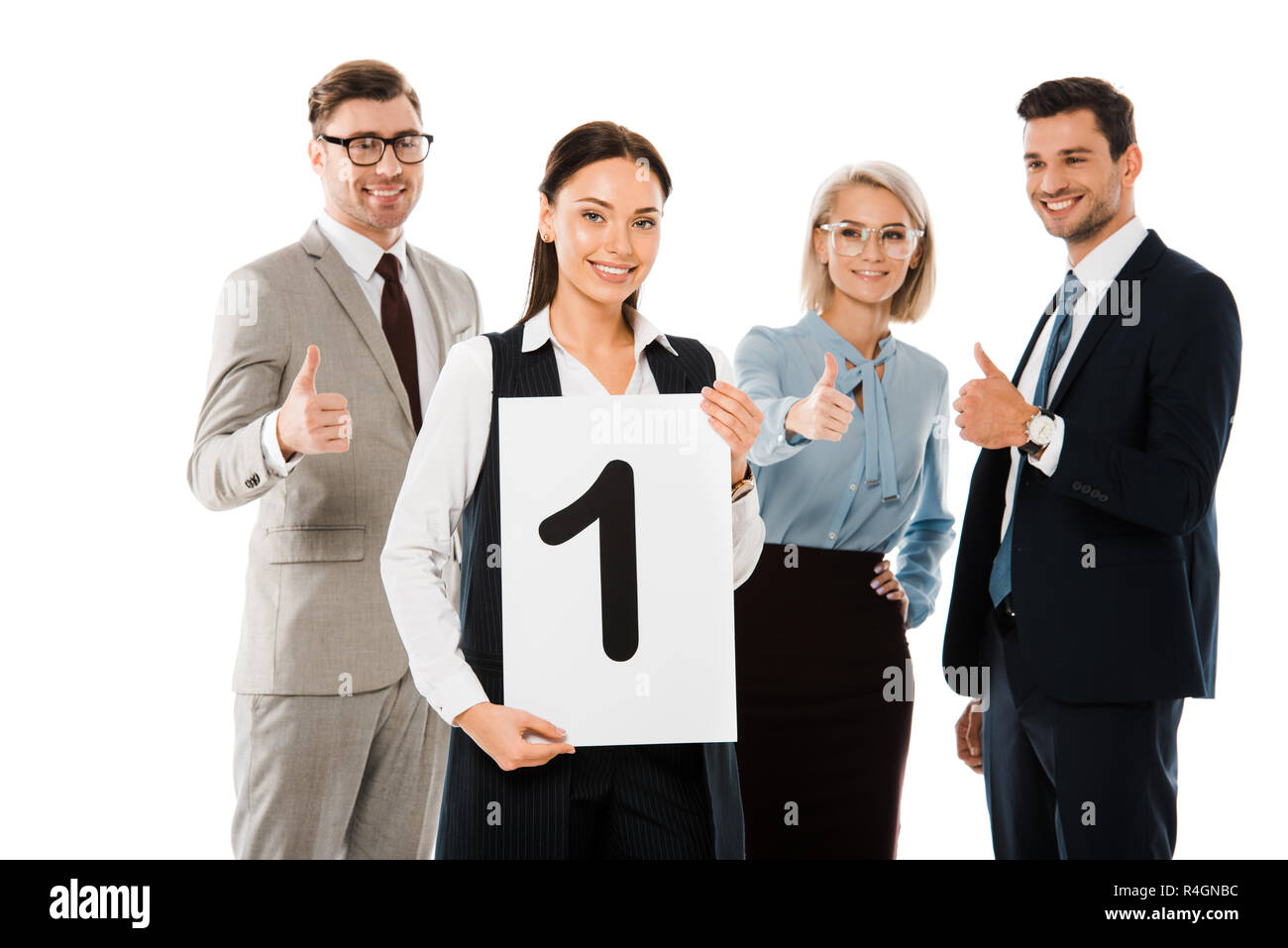 female leader holding placard with number one while colleagues showing ...