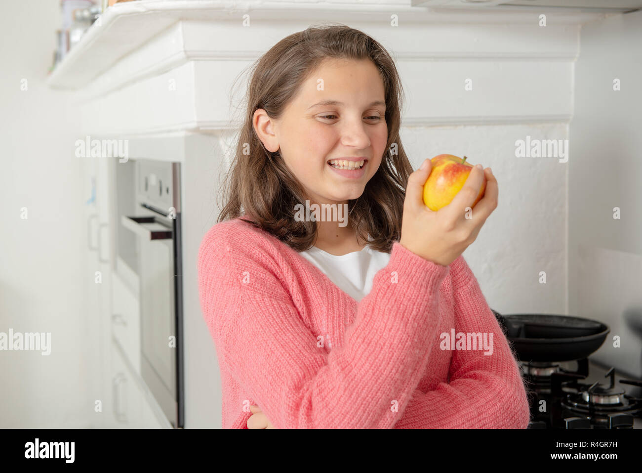 Teenager eating fruit teeth hi-res stock photography and images - Alamy