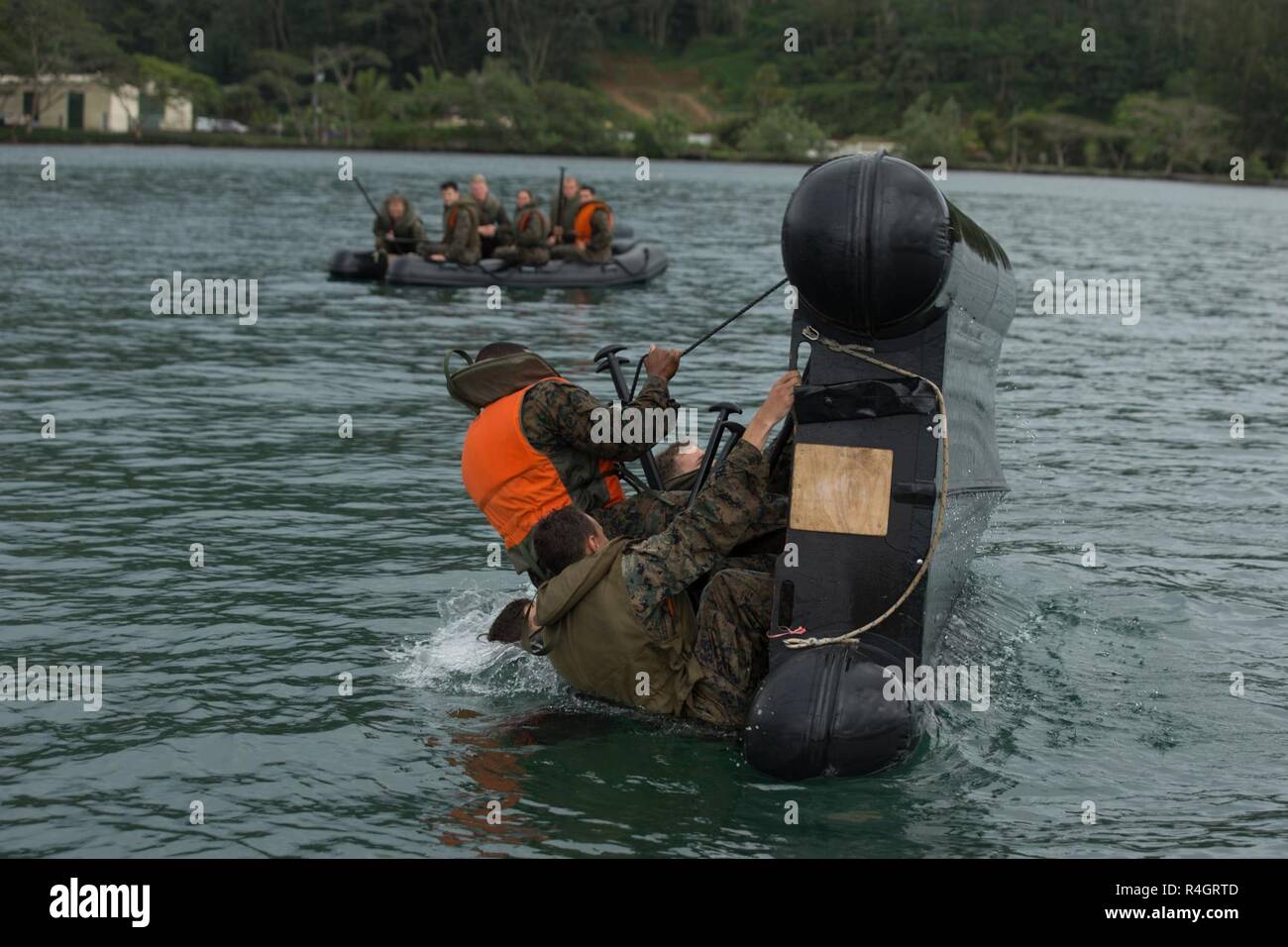 U.S. Marines and Sailors, with Task Force Koa Moana, capsize a French ...