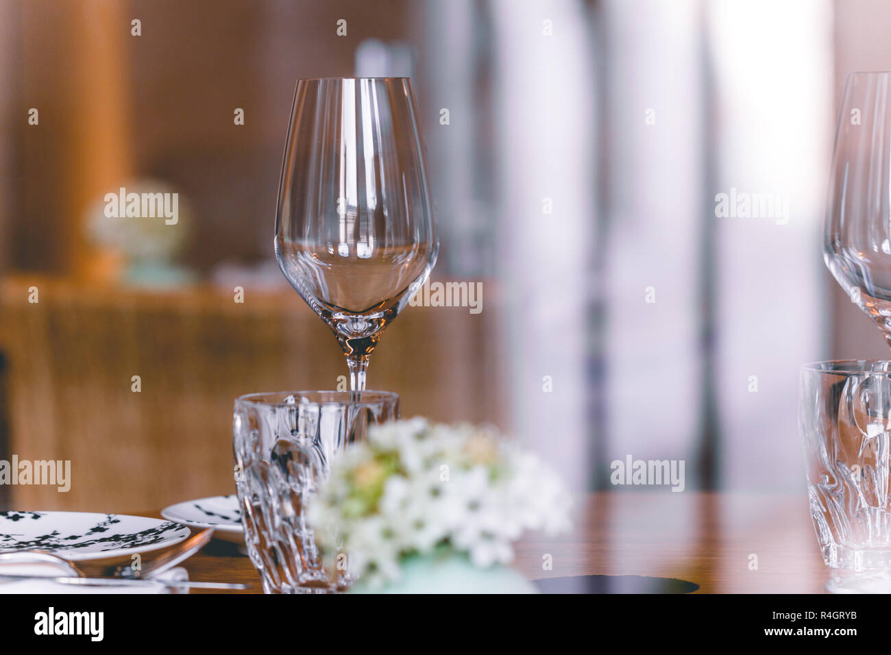 Table setting in a French restaurant. View through a window from a ...