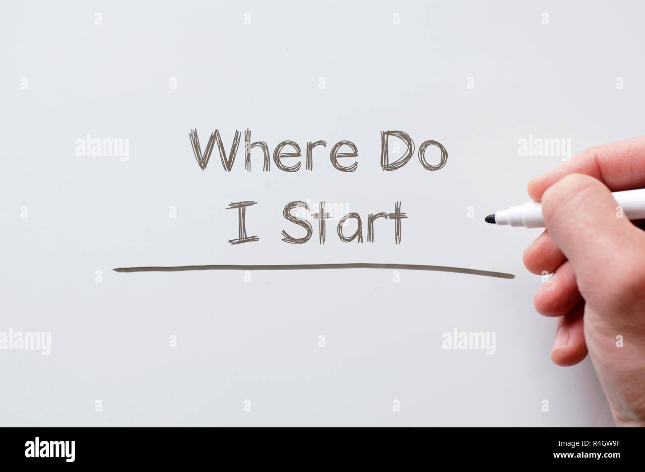 Where do i start written on whiteboard Stock Photo - Alamy