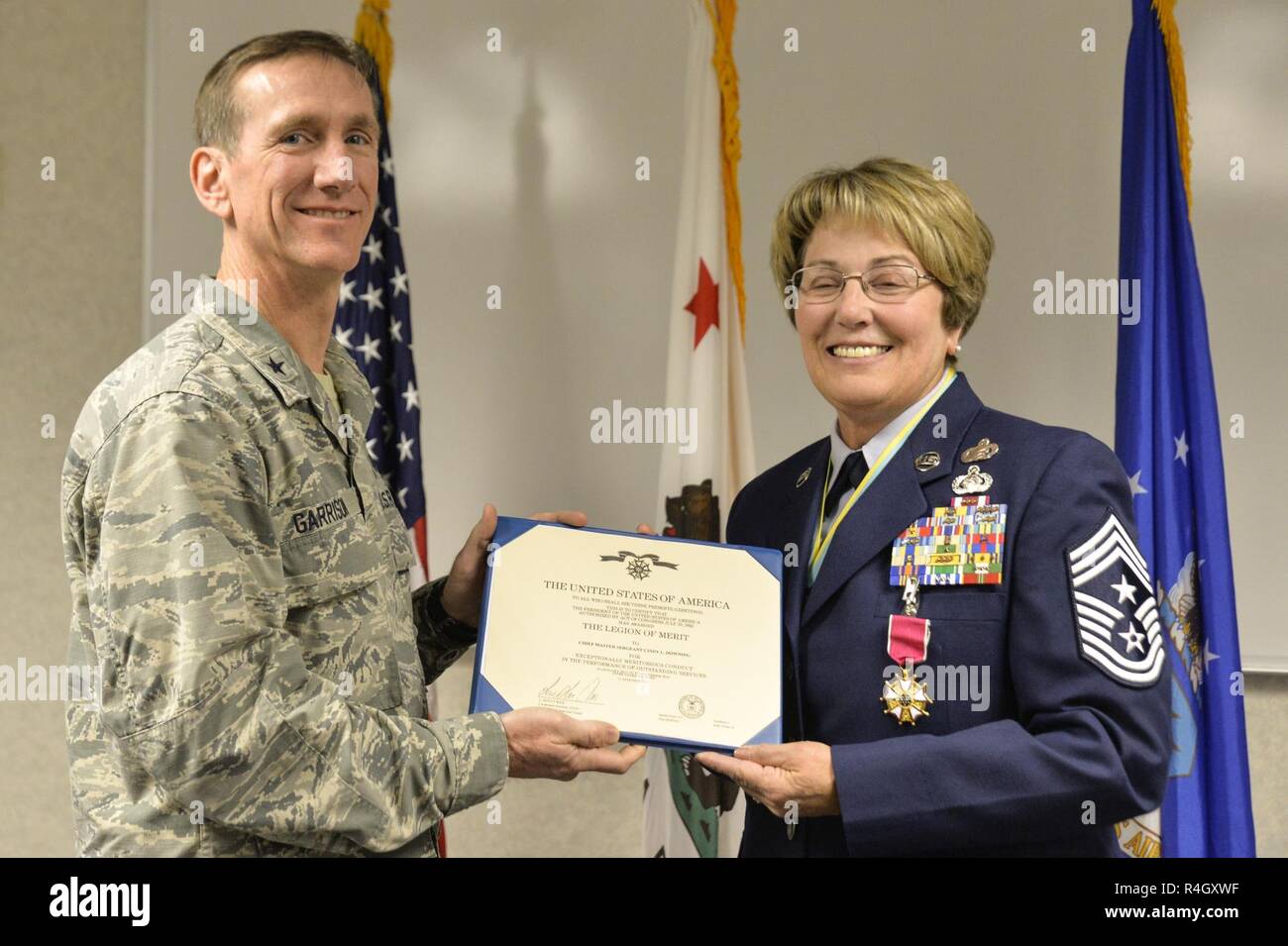 Brig. Gen. Clay Garrison and Chief Master Sgt. (ret.) Cindy Downing ...