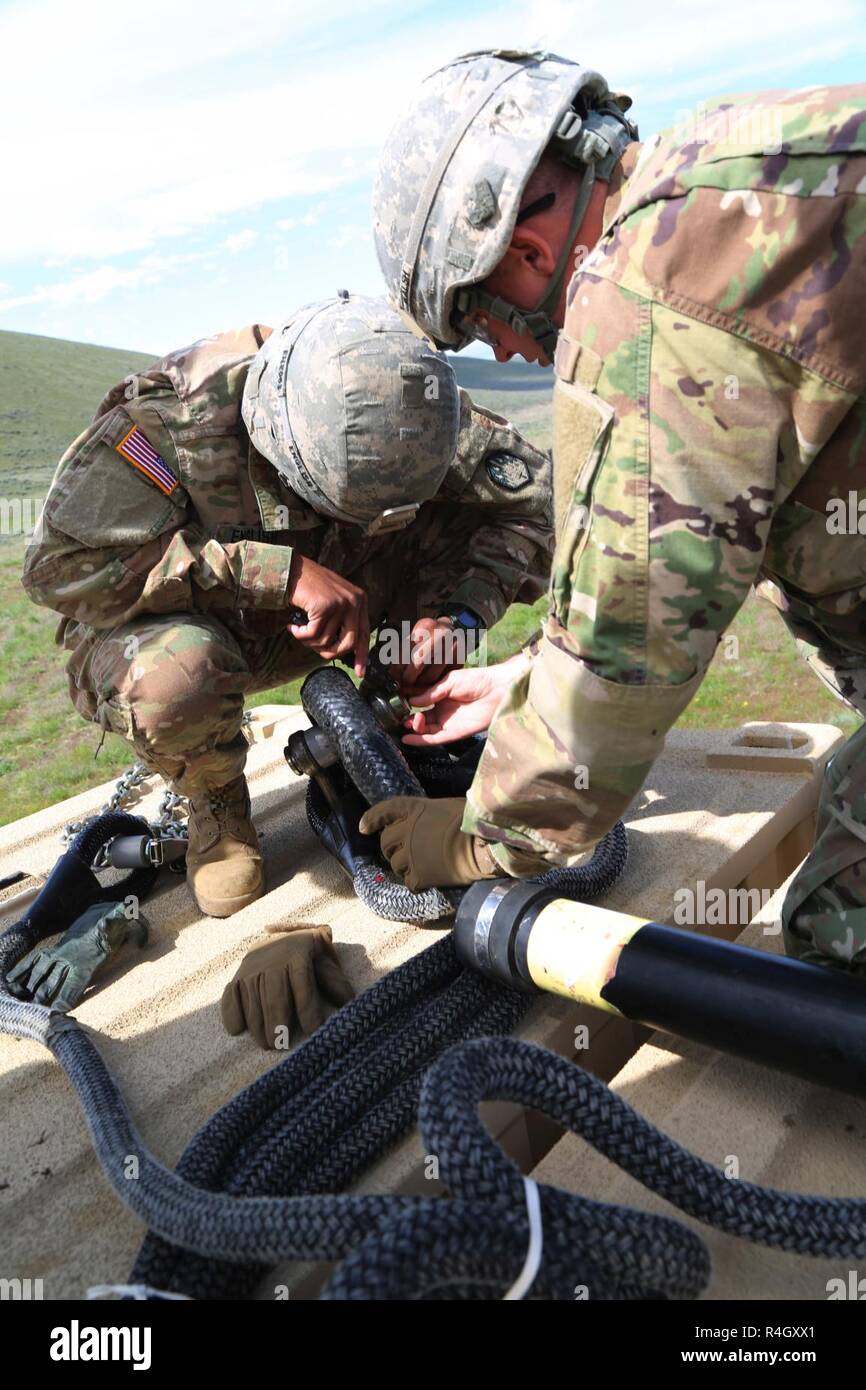 U.S. Army Sgt. Patrick Walsh and Sgt. Deron English, 21st Chemical ...