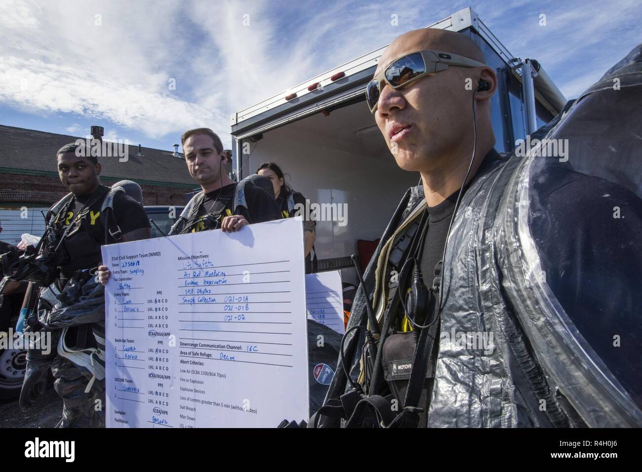 U.S. Army survey team members Staff Sgt. Nicky Lam, left, Sgt. Joseph A ...