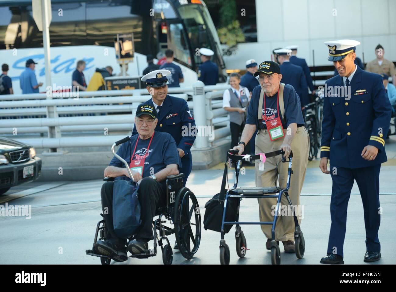 Petty Officer 3rd Class Kevin Chan and Lt. Anthony Solares, both from ...