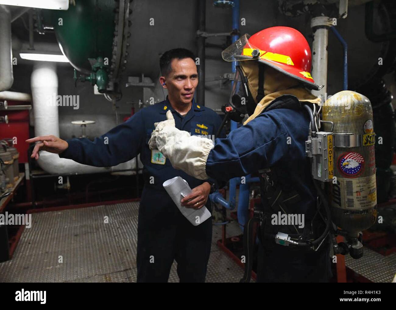 SOUTH CHINA SEA (Sept. 26, 2018) LCDR Edwin Catubig, chief engineer ...