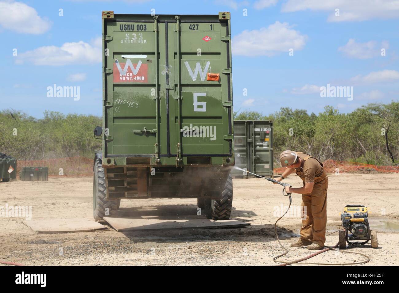 U.S. Navy Equipment Operator 1st Class James Figueroa, assigned to ...