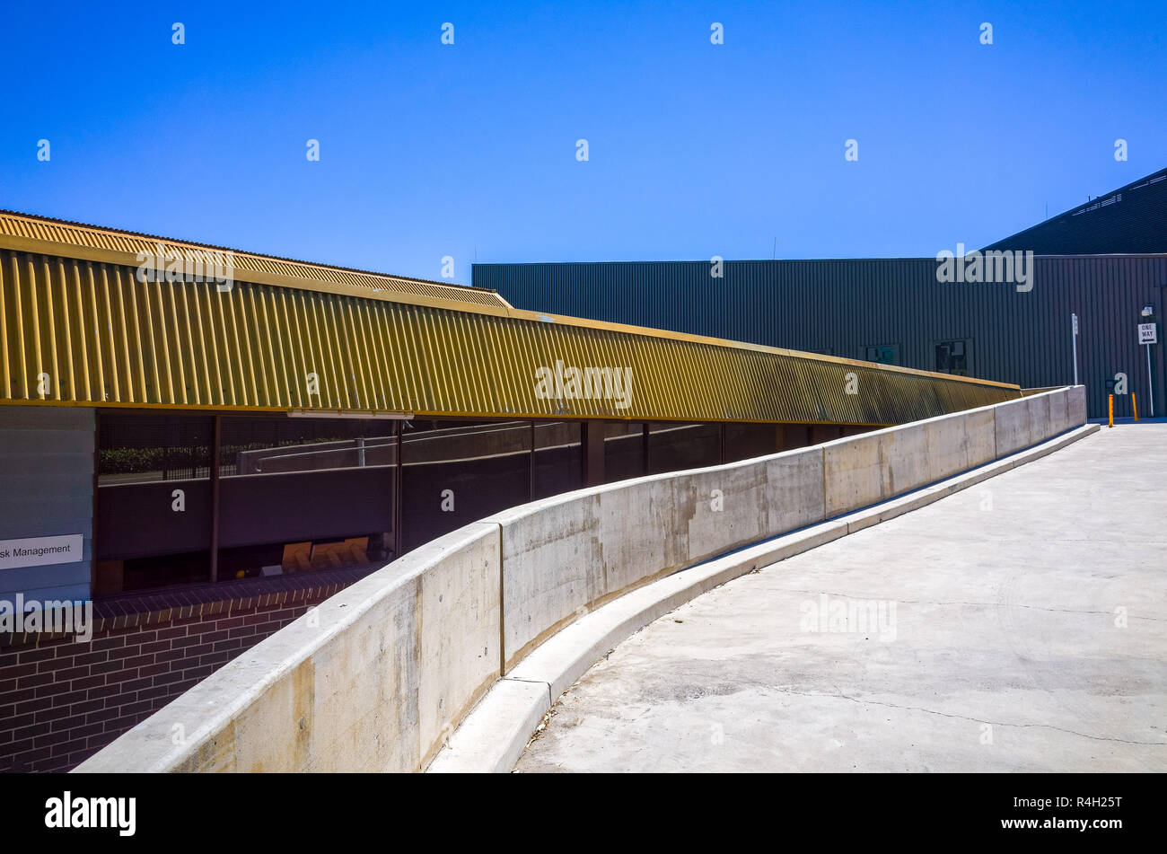 Concrete ramp alongside a building Stock Photo - Alamy