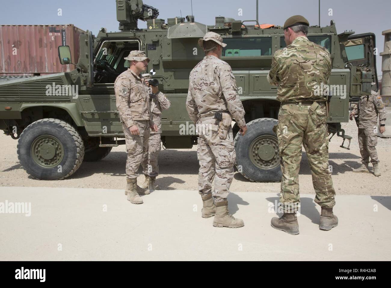 A Spanish General shows Spanish army vehicles to visiting British ...