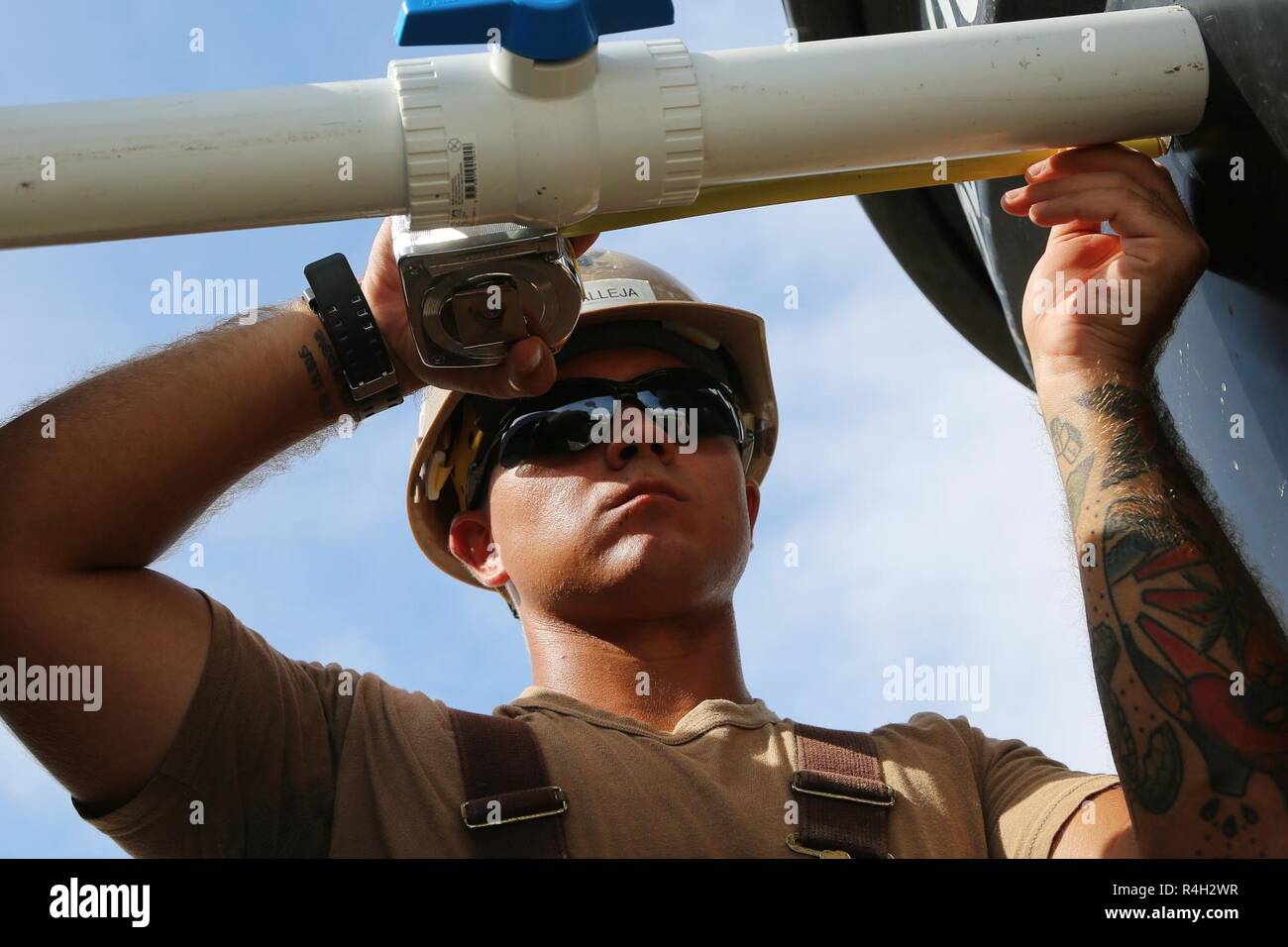 U.S. Navy Utilitiesman 2nd Class Anthony Calleja, assigned to Naval ...