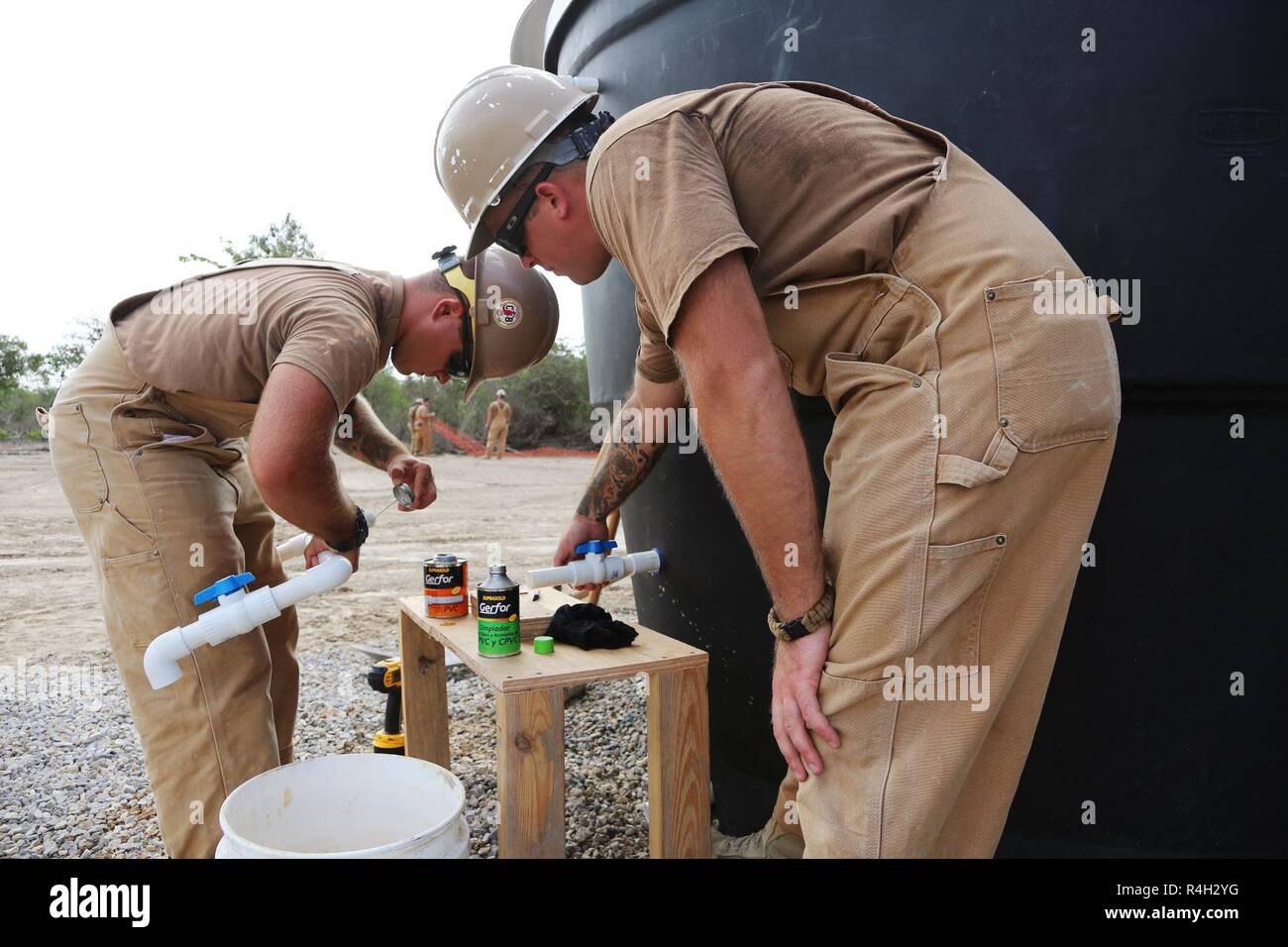 U.S. Navy Utilitiesman 2nd Class Anthony Calleja (left) and Equipment ...