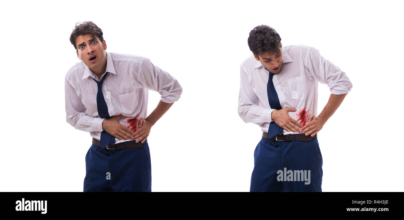 Wounded businessman with blood stains isolated on white background ...