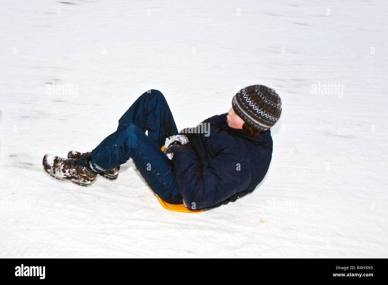 Children playing on a toboggan hi-res stock photography and images - Alamy