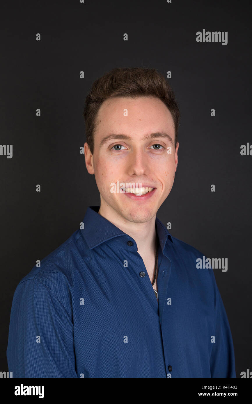 portrait of smart looking young man Stock Photo - Alamy
