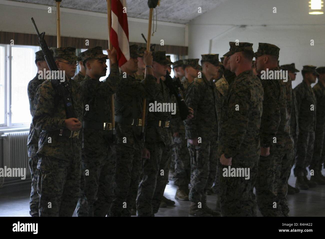 U.S. Marines with, 1st Battalion, 6th Marine Regiment salute the Marine ...