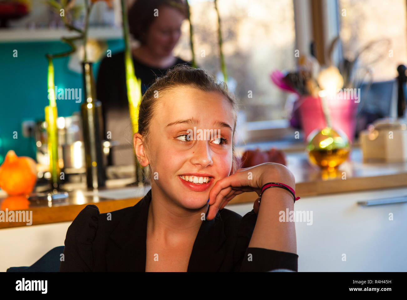 portrait of attractive girl smiling at home Stock Photo - Alamy