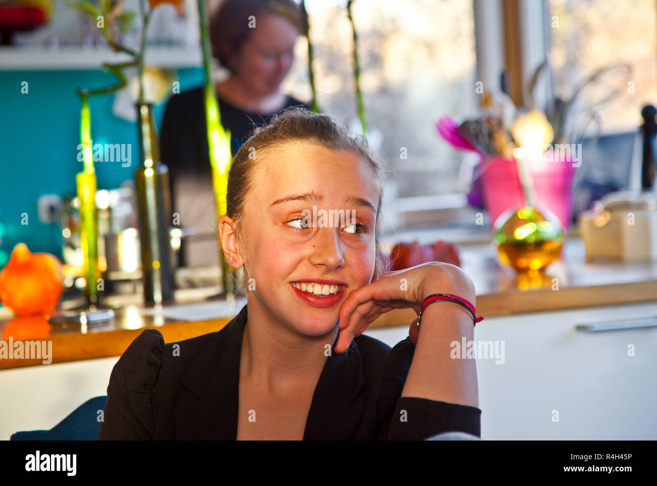 portrait of attractive girl smiling at home Stock Photo - Alamy