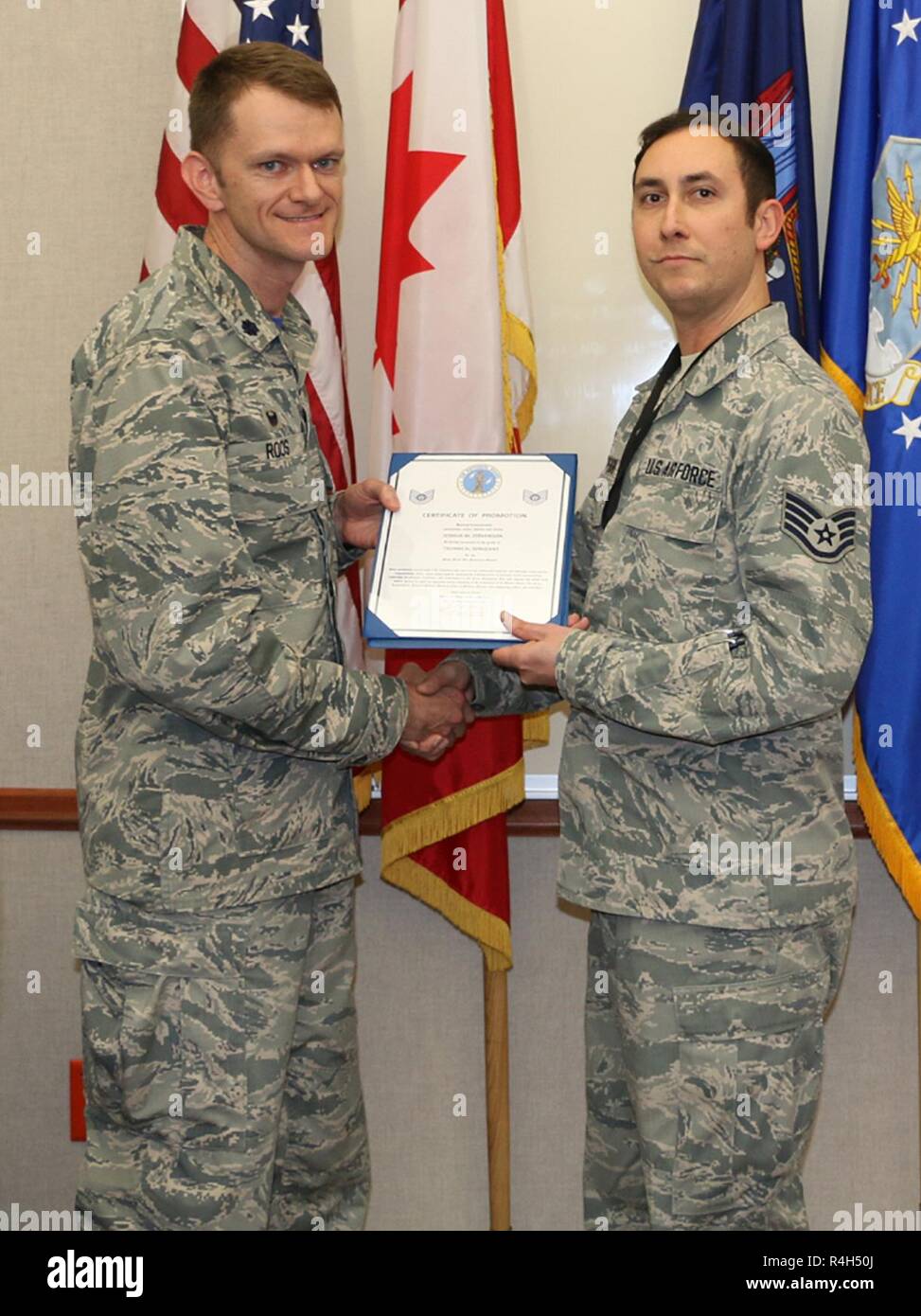 Tech. Sgt. Joshua Stevenson, right, was promoted on Sept. 28 during a ...