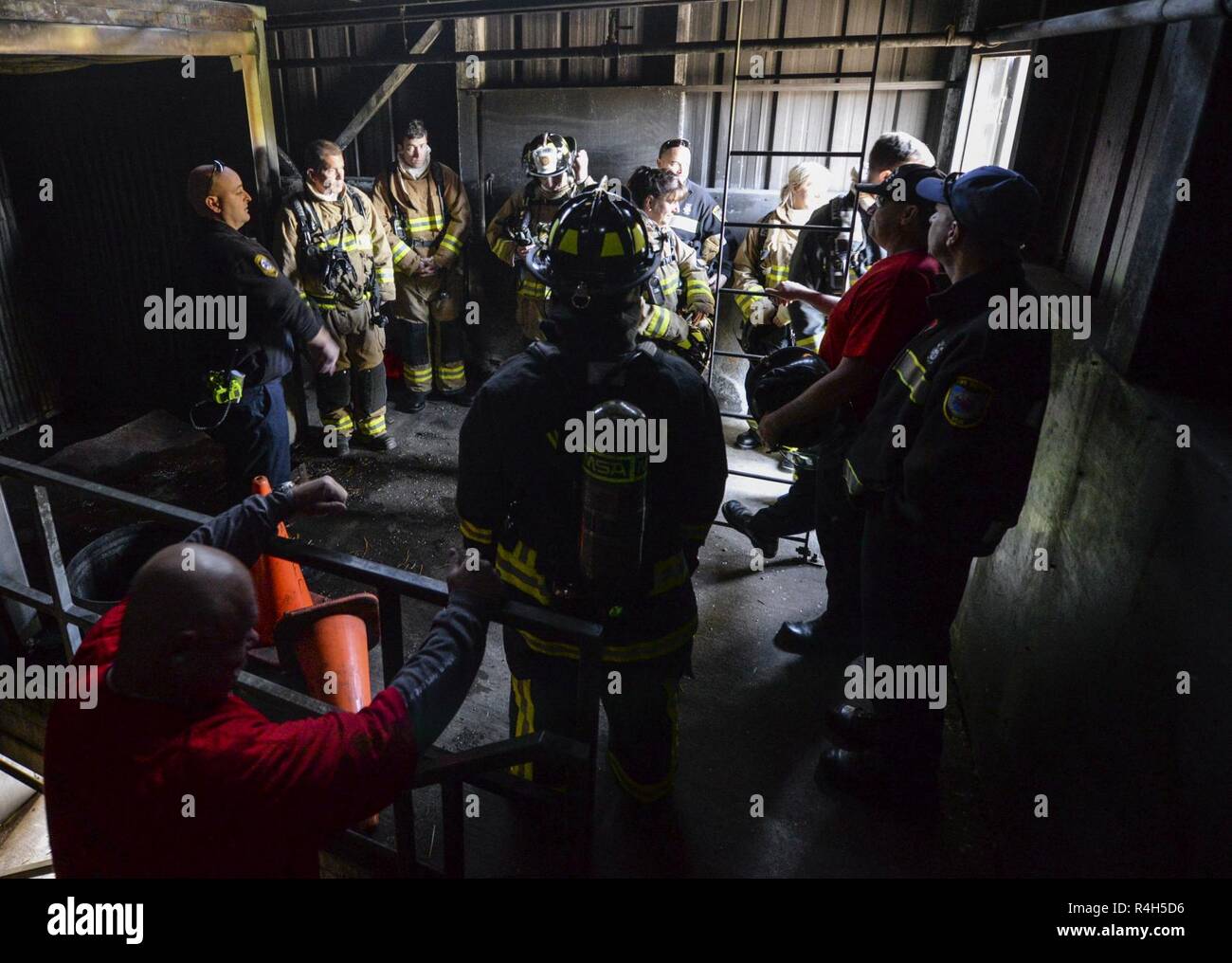 Participants of the Fire Ops 101 event receive a familiarization ...