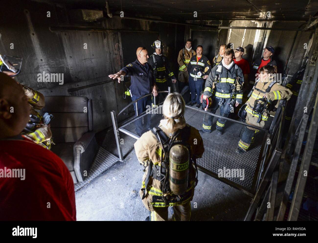 Participants of the Fire Ops 101 event receive a familiarization ...