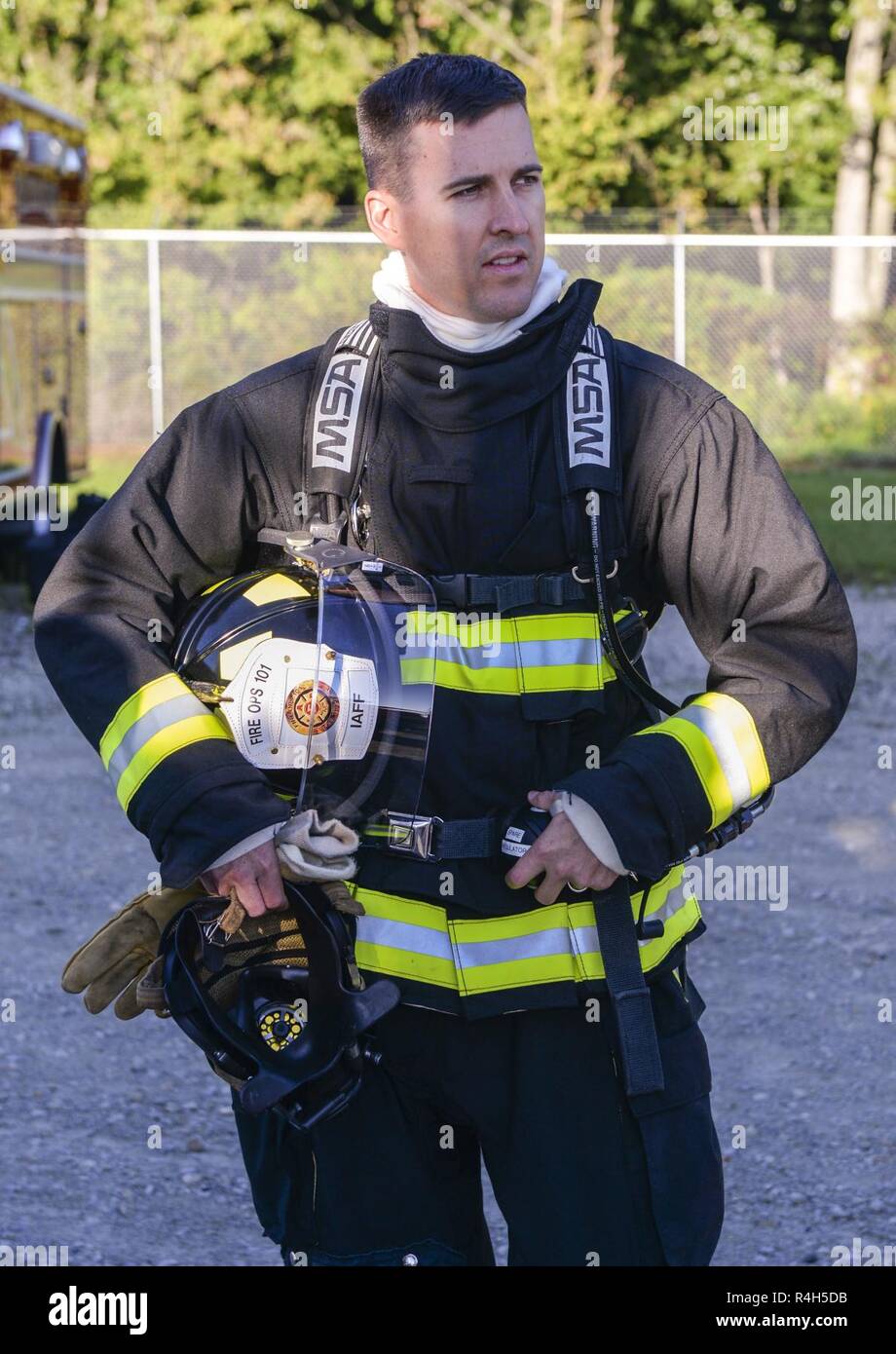 Maj. Tyler Johnson, 788th Civil Engineer Squadron commander, listens to ...