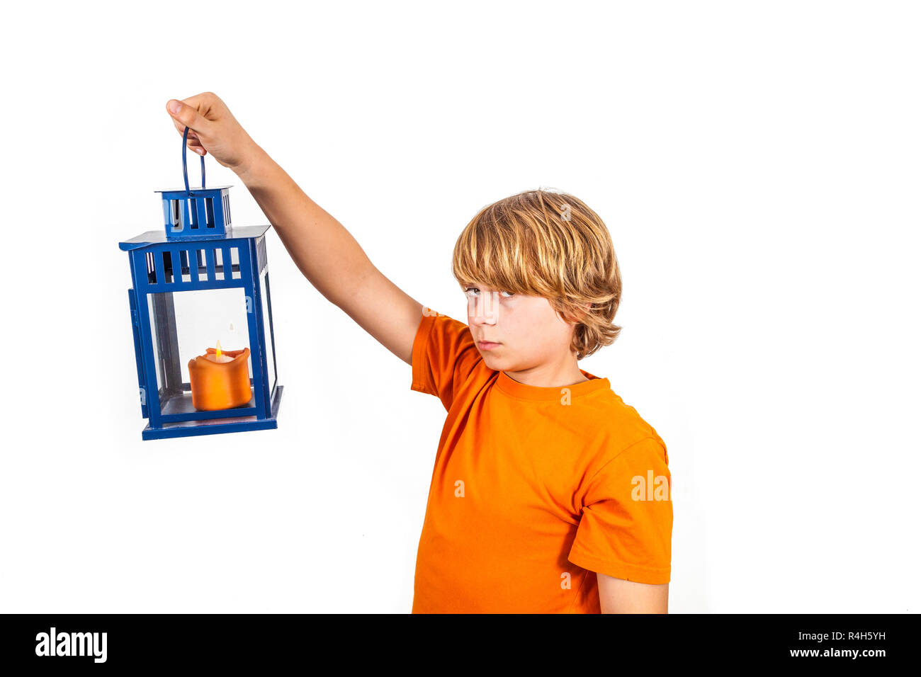 cute boy holding a hand lantern Stock Photo - Alamy